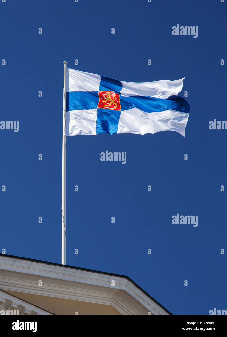The State flag of Finland flying over the Main Building of Helsinki ...