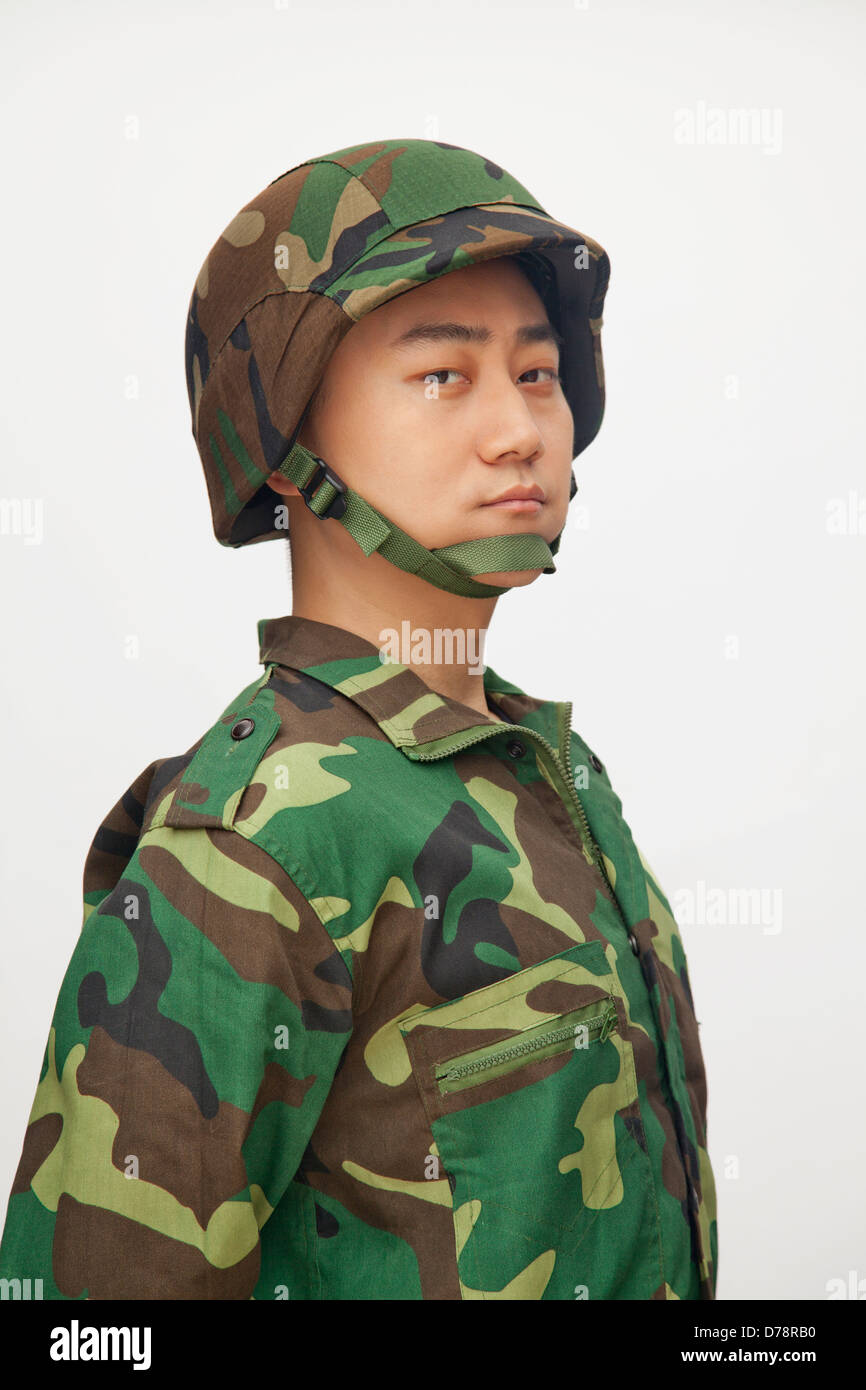 Portrait of man in military uniform, studio shot Stock Photo - Alamy