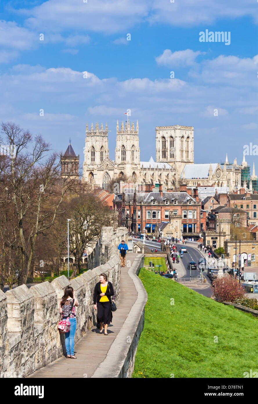 York Minster and tourists walking along a section of the historic city ...