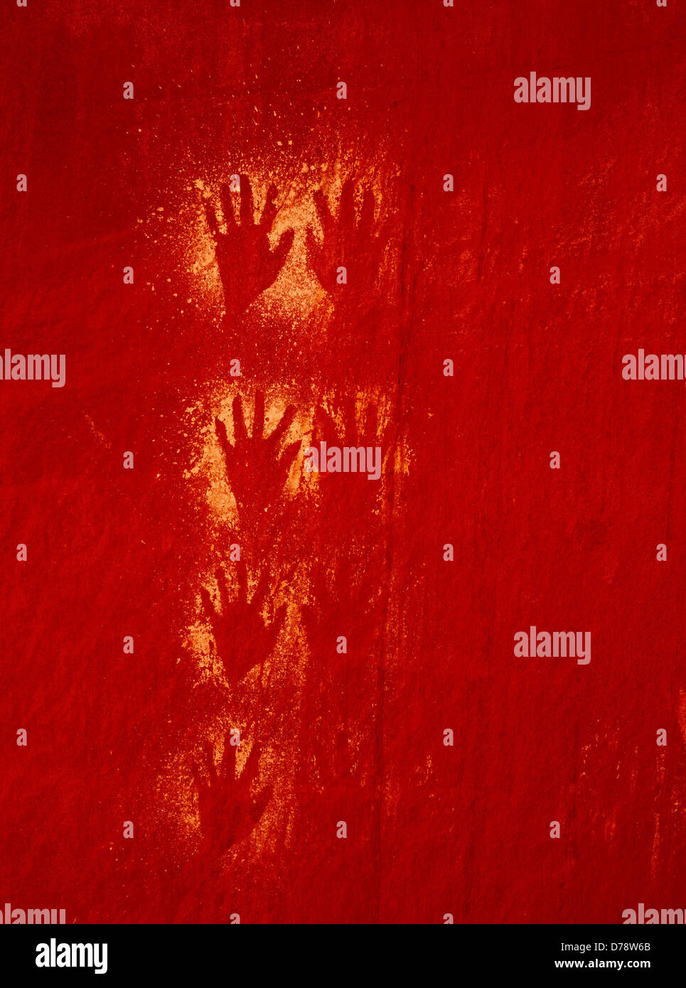 Ancient intaglio hand prints painted on wall sandstone shelter above ...