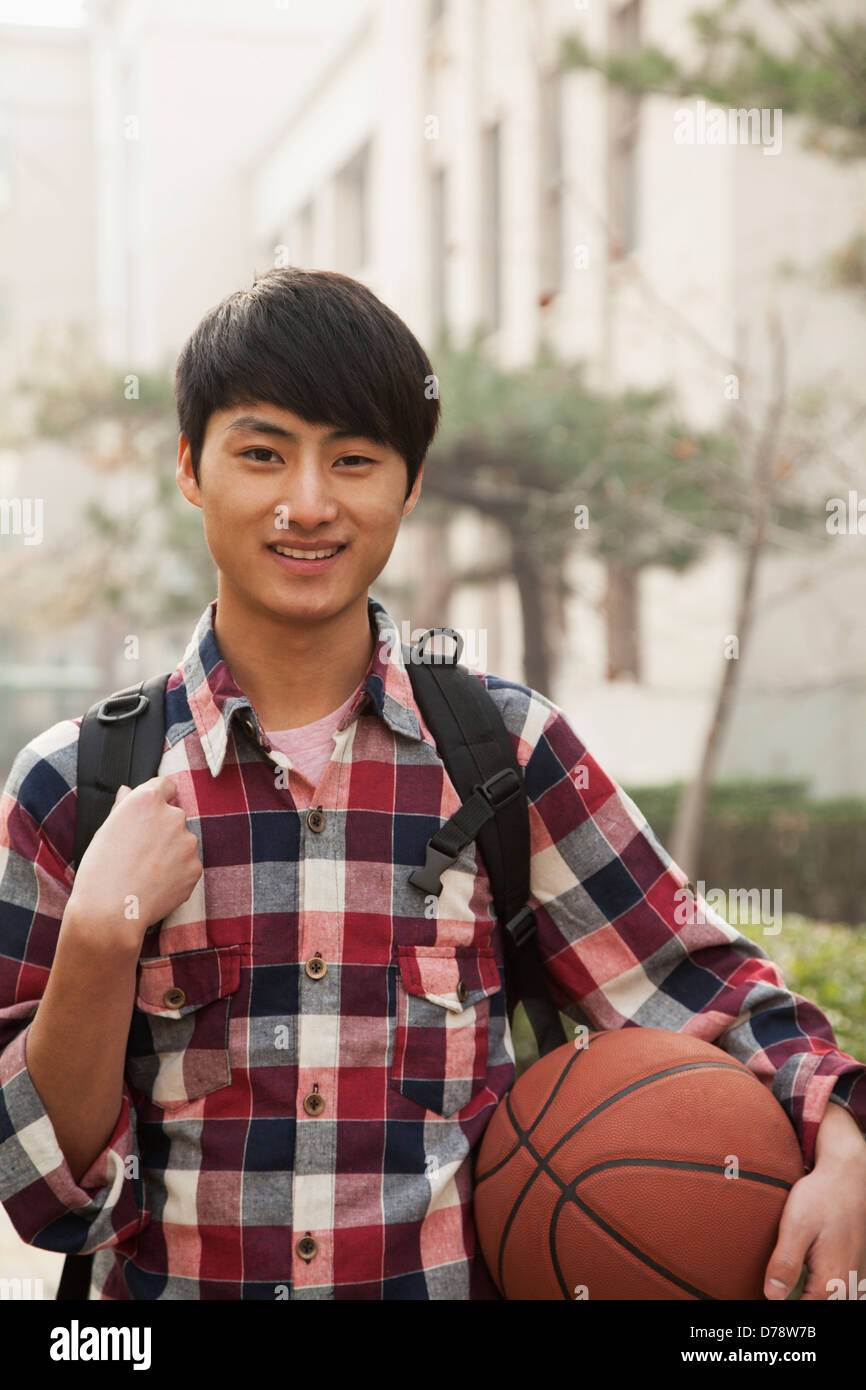 Student portrait on college campus Stock Photo - Alamy