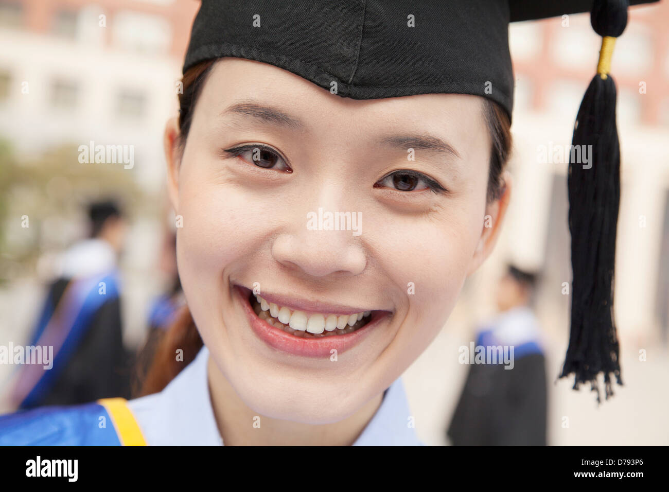 Young Female Graduate Smiling, Close Up Stock Photo - Alamy