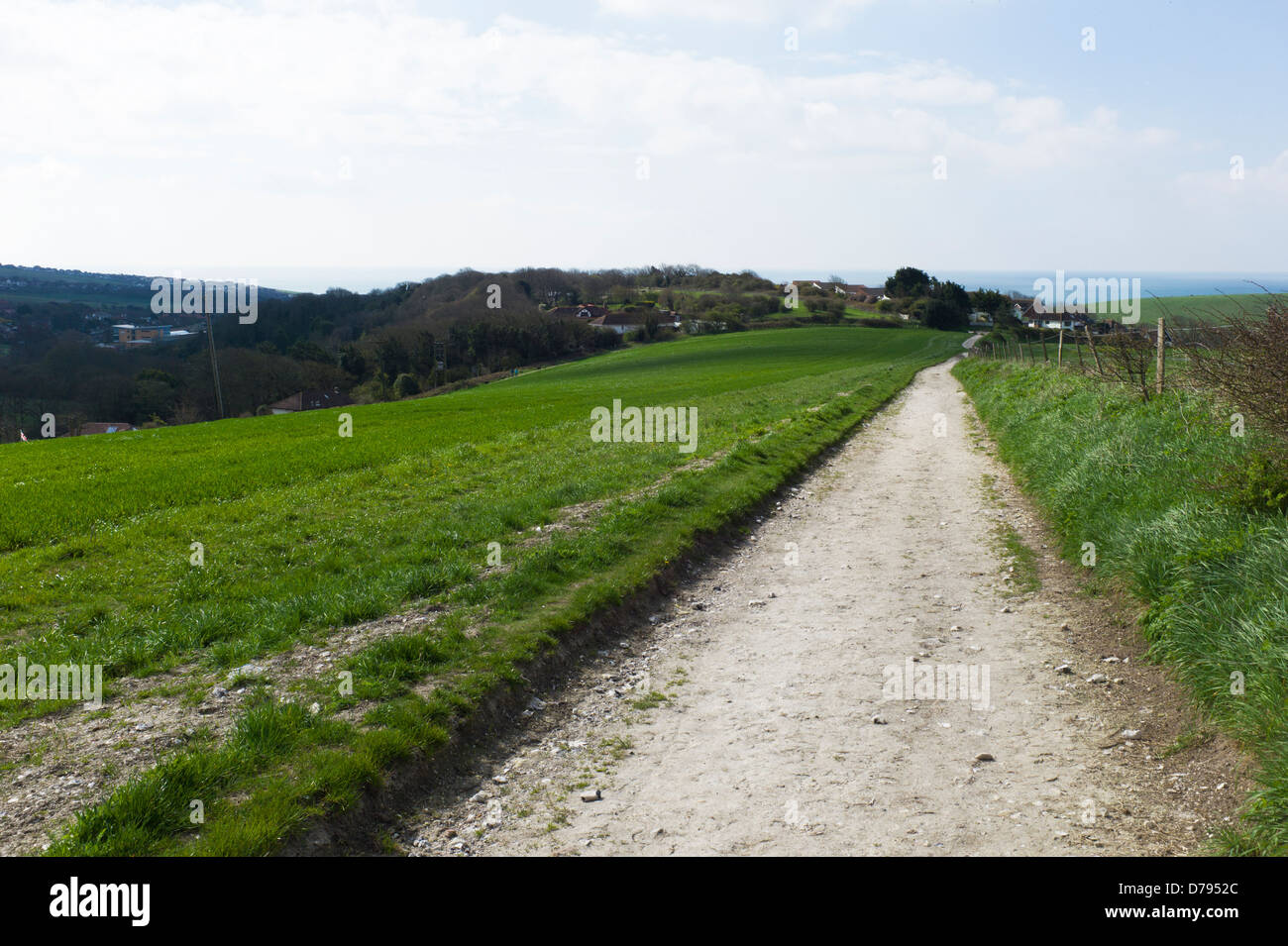Footpath through fields, distant sea views Stock Photo - Alamy