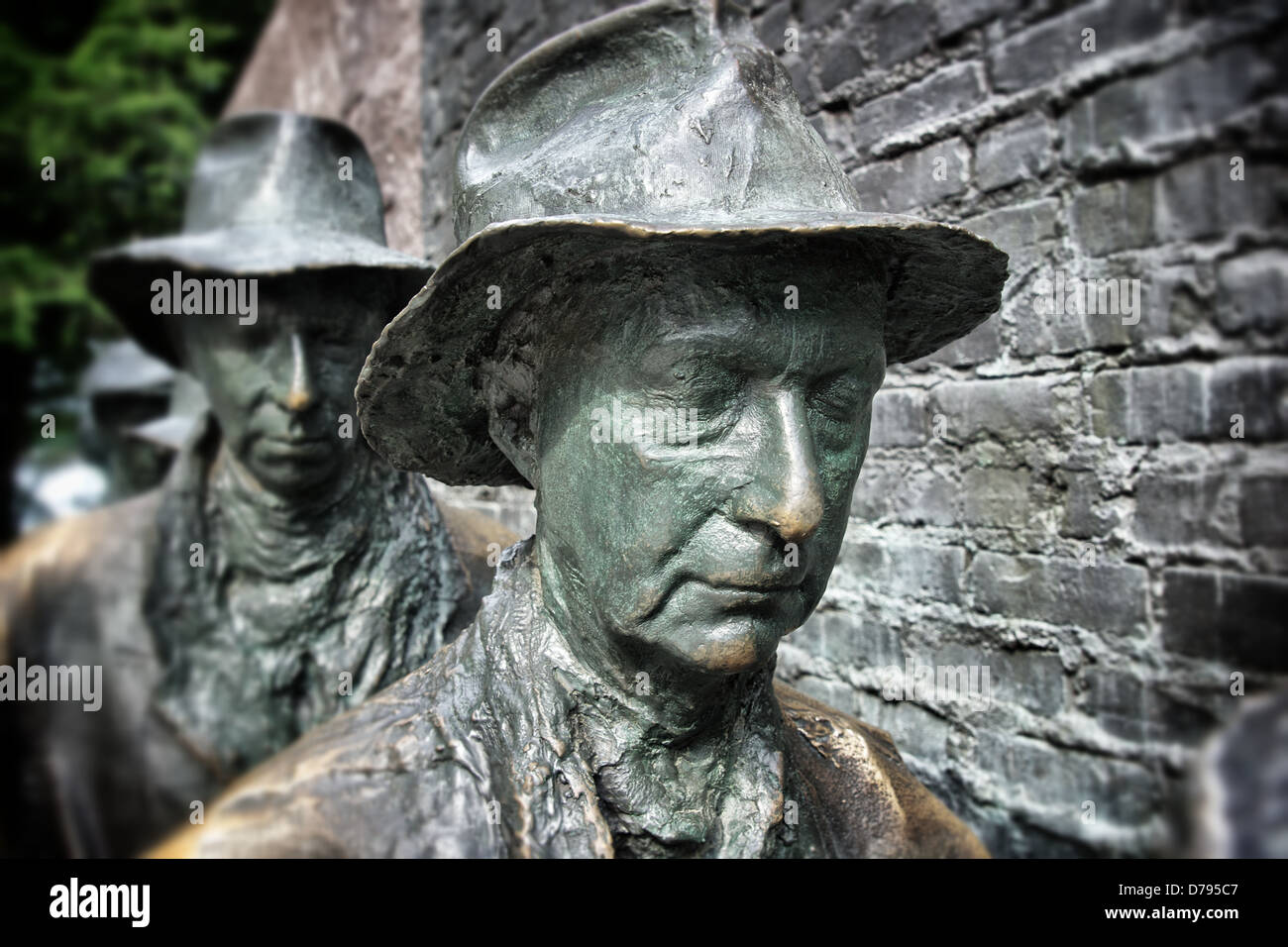 Statue of unemployed workers in a line representing the Great ...