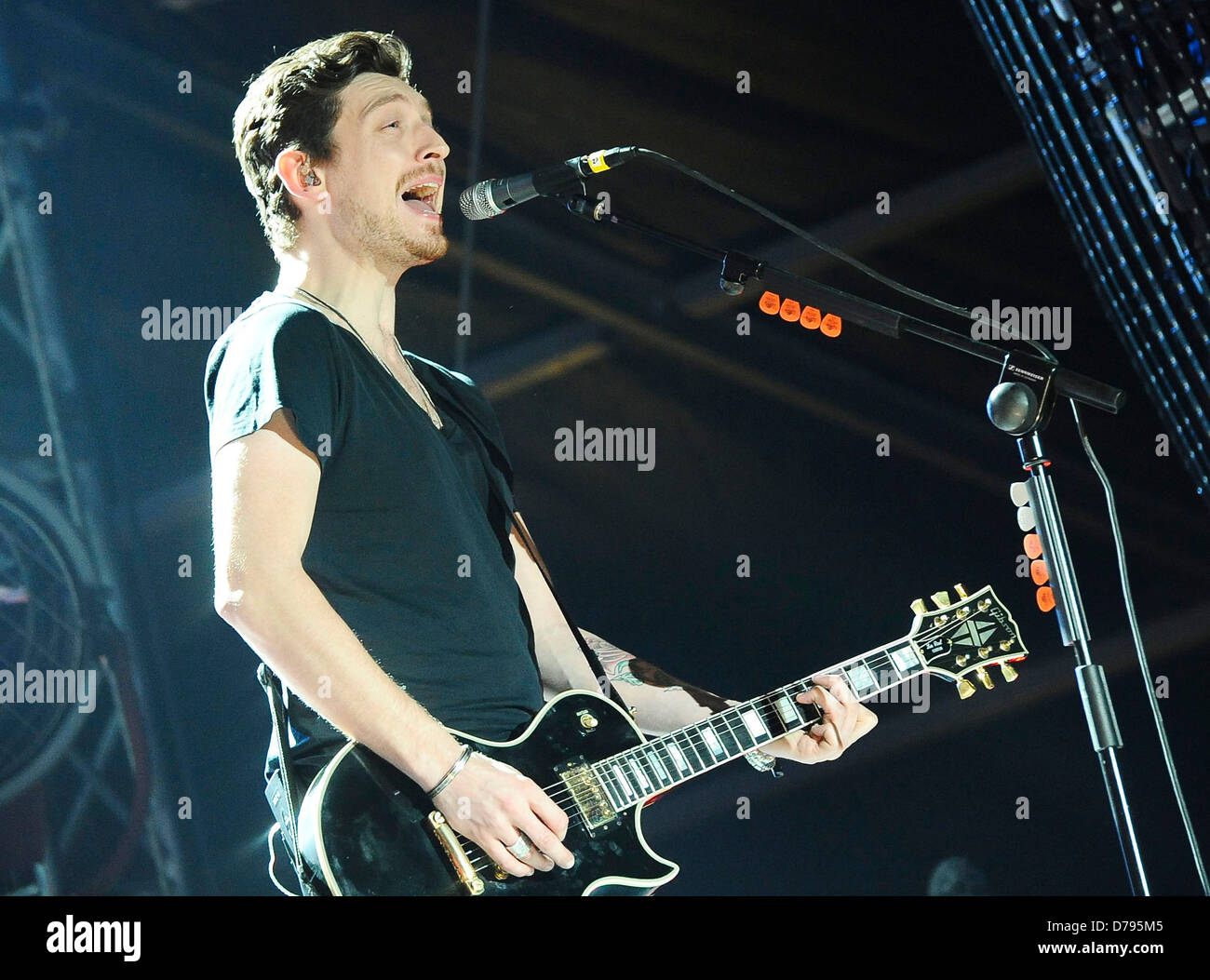 Nathan Connolly of Snow Patrol performs on stage during a rehearsal ...
