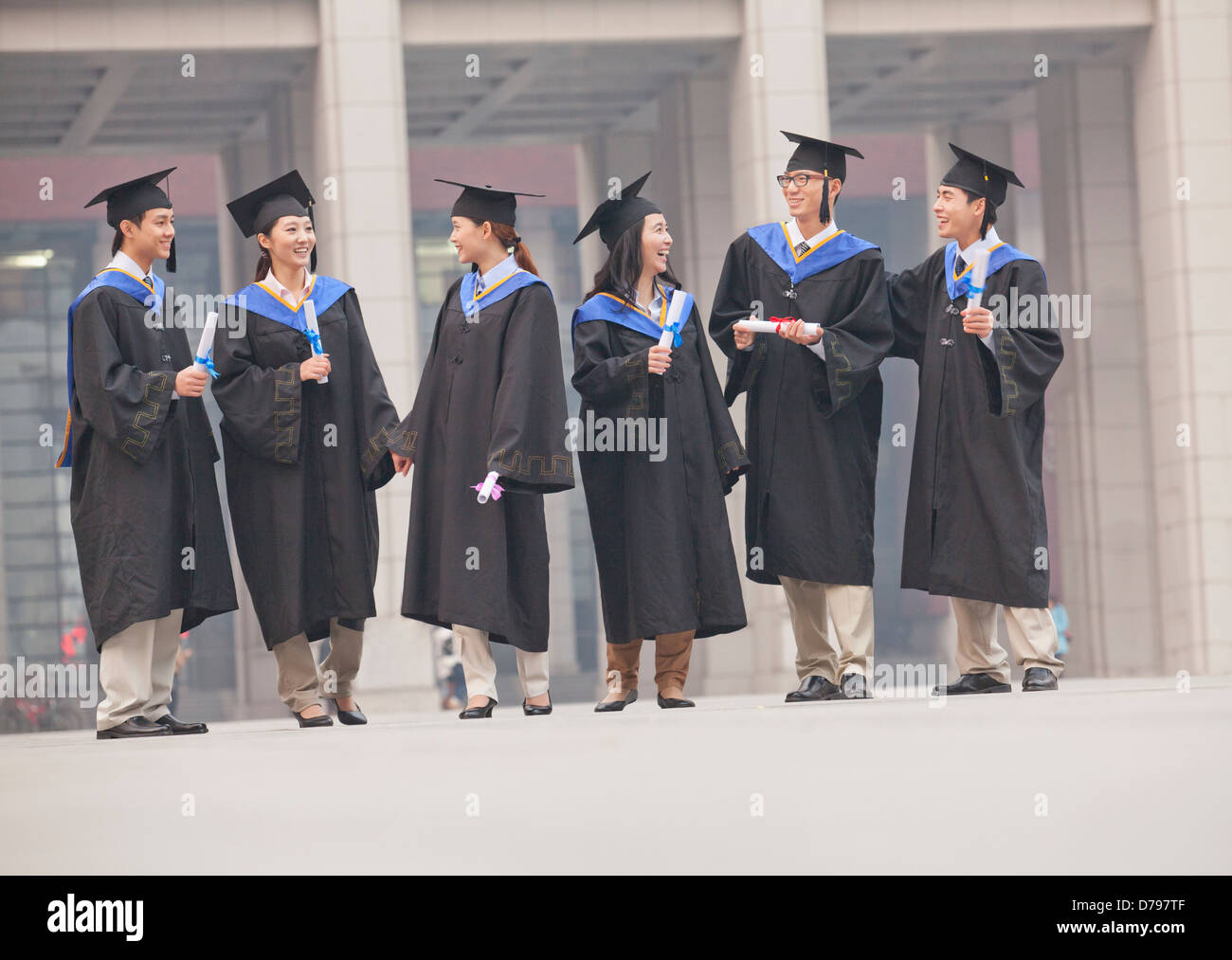 Group of Graduate Students Standing with Diplomas Stock Photo - Alamy