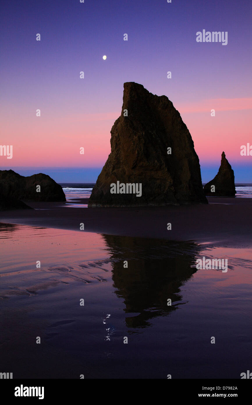 Sunrise Moon Over Sea Stacks on Face Rock Beach Stock Photo - Alamy