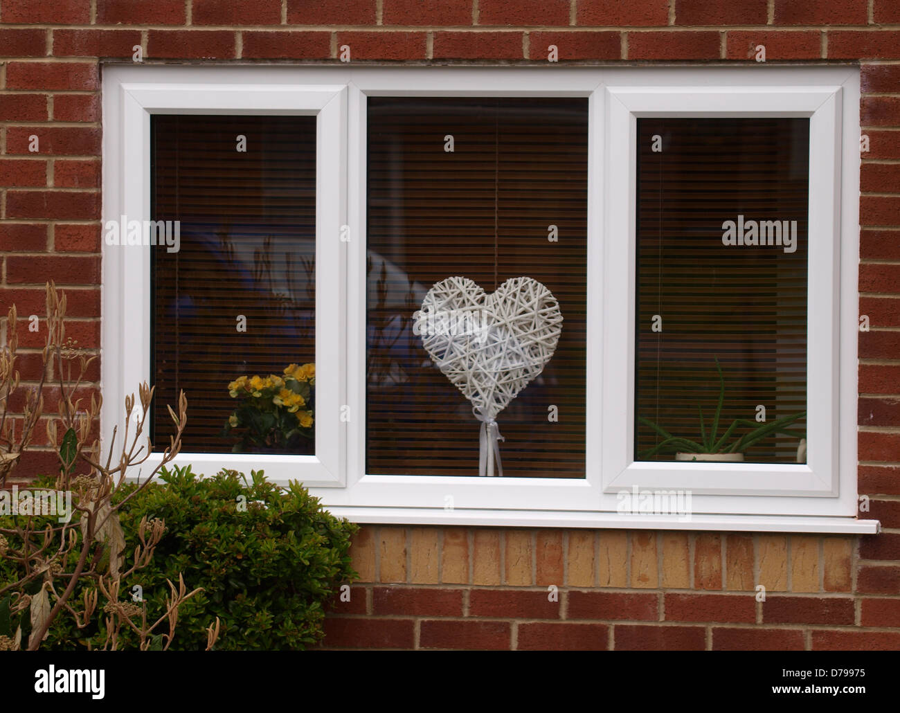 Heart in a window, UK 2013 Stock Photo - Alamy