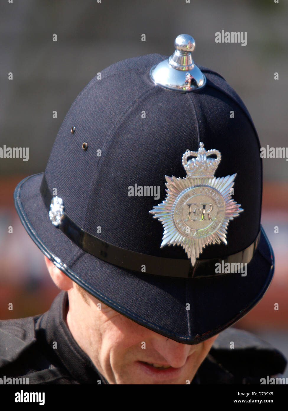 Black english bobby policeman hat hi-res stock photography and images ...