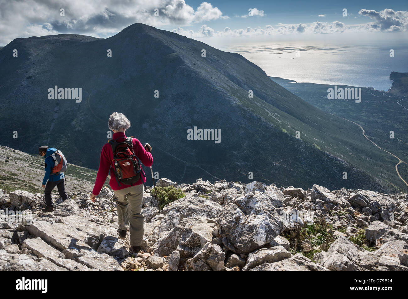 Walkers descending from Agia Pelagia above Kita in the Inner Mani ...