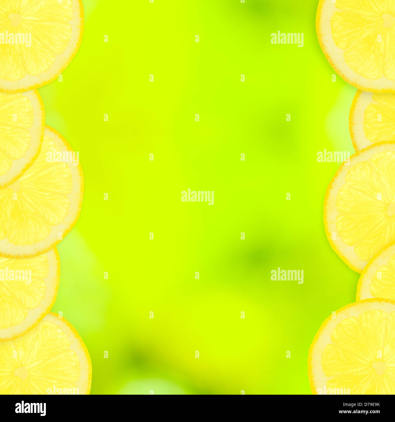 green abstract background with slices of lemon on right and left side ...