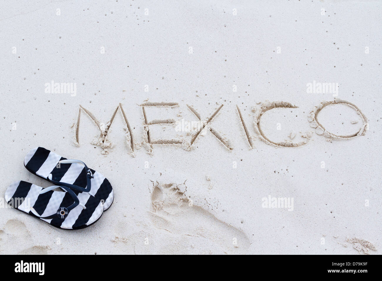 Mexico written on the beach with wave Stock Photo - Alamy