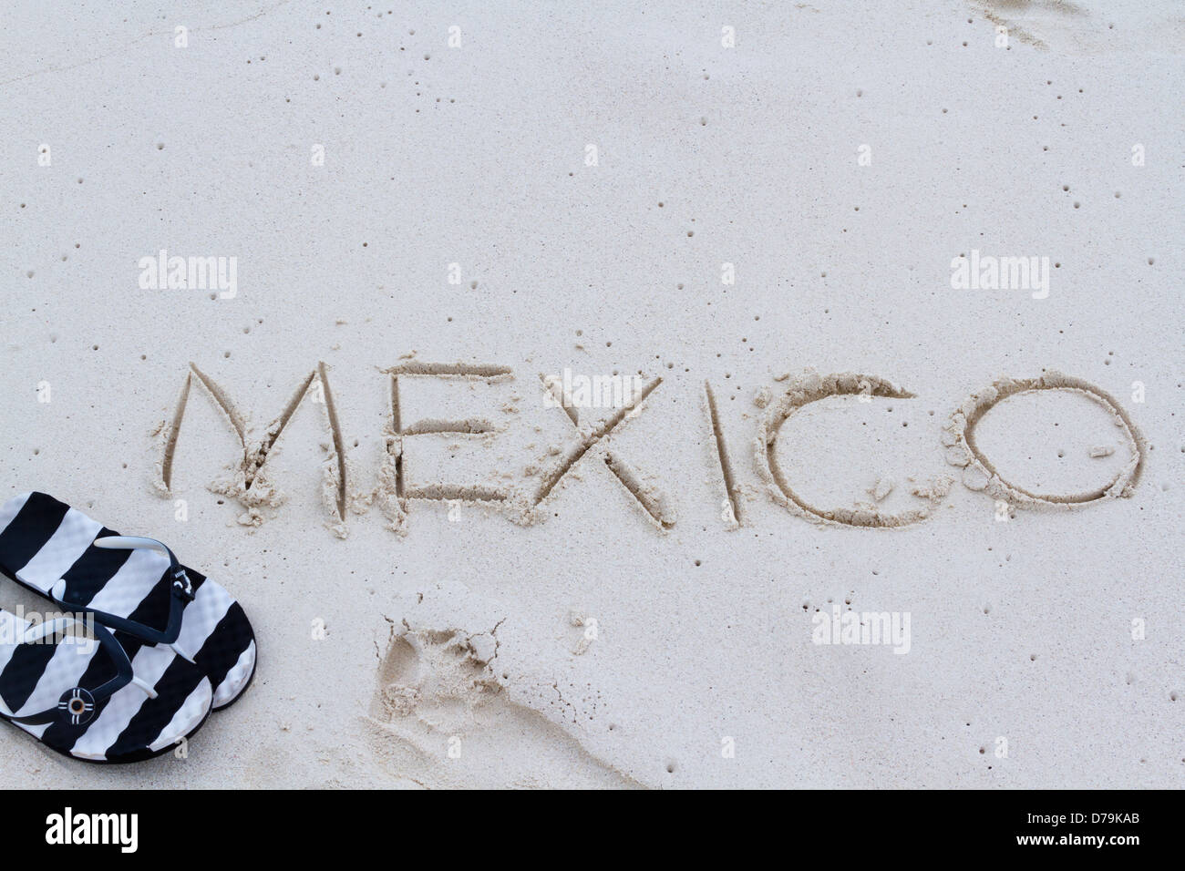 Mexico written on the beach with wave Stock Photo - Alamy