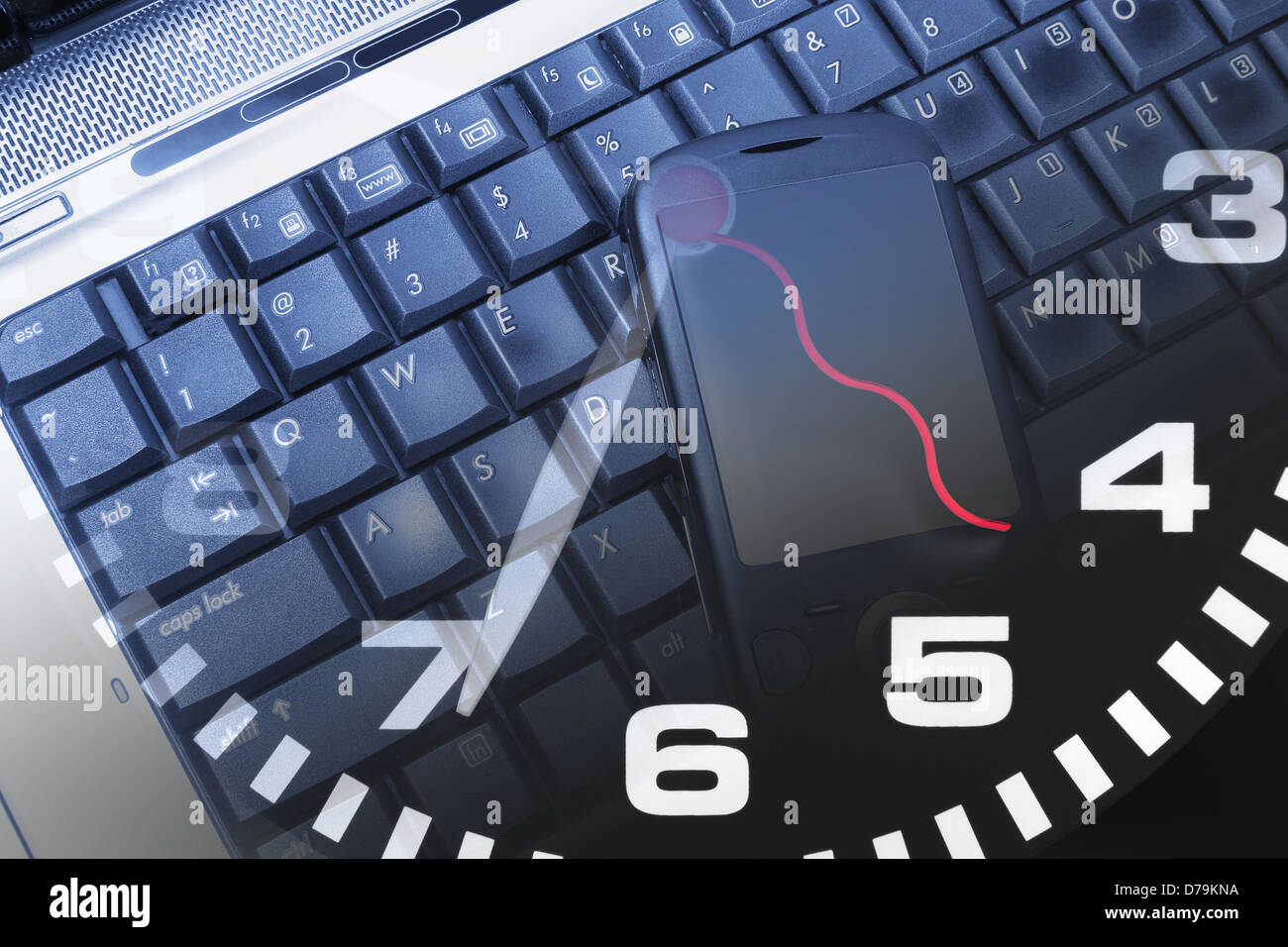 Clock with Laptop and Smart Phone Stock Photo - Alamy