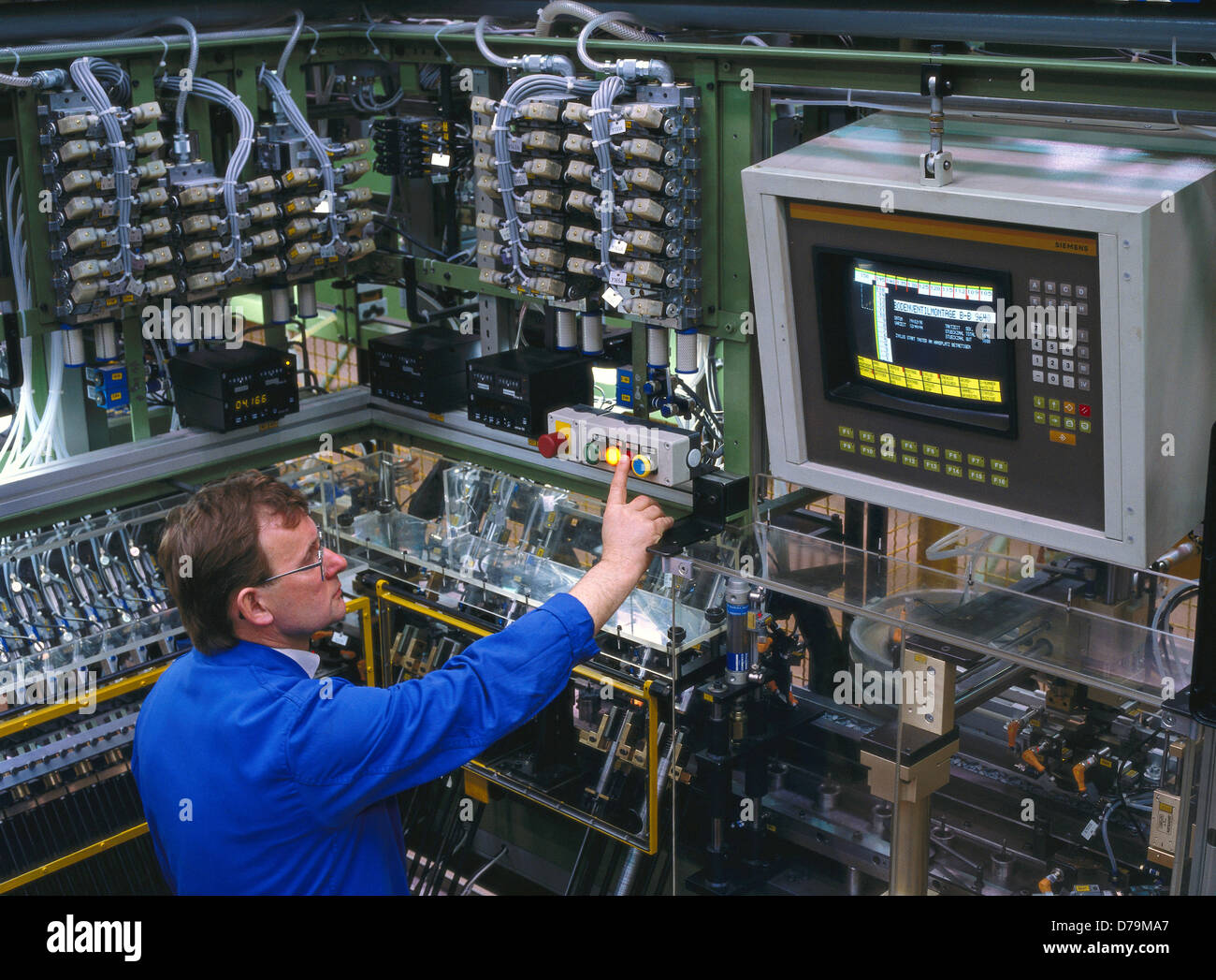 Automatic assembly line production shock absorber Stock Photo - Alamy