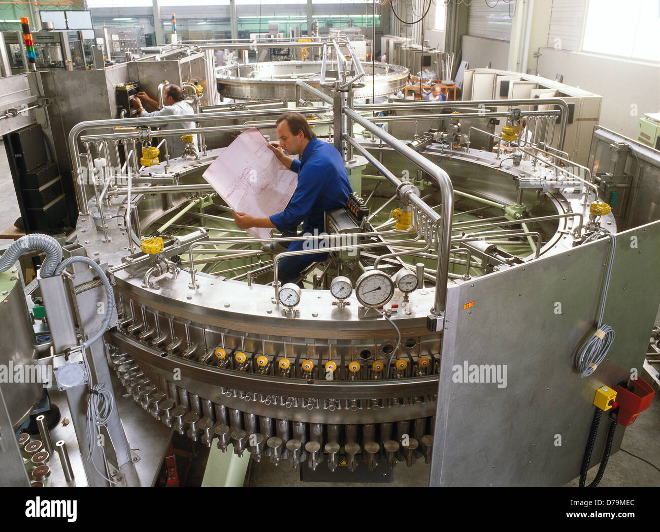 Assembly filling machine beverage industry Stock Photo - Alamy
