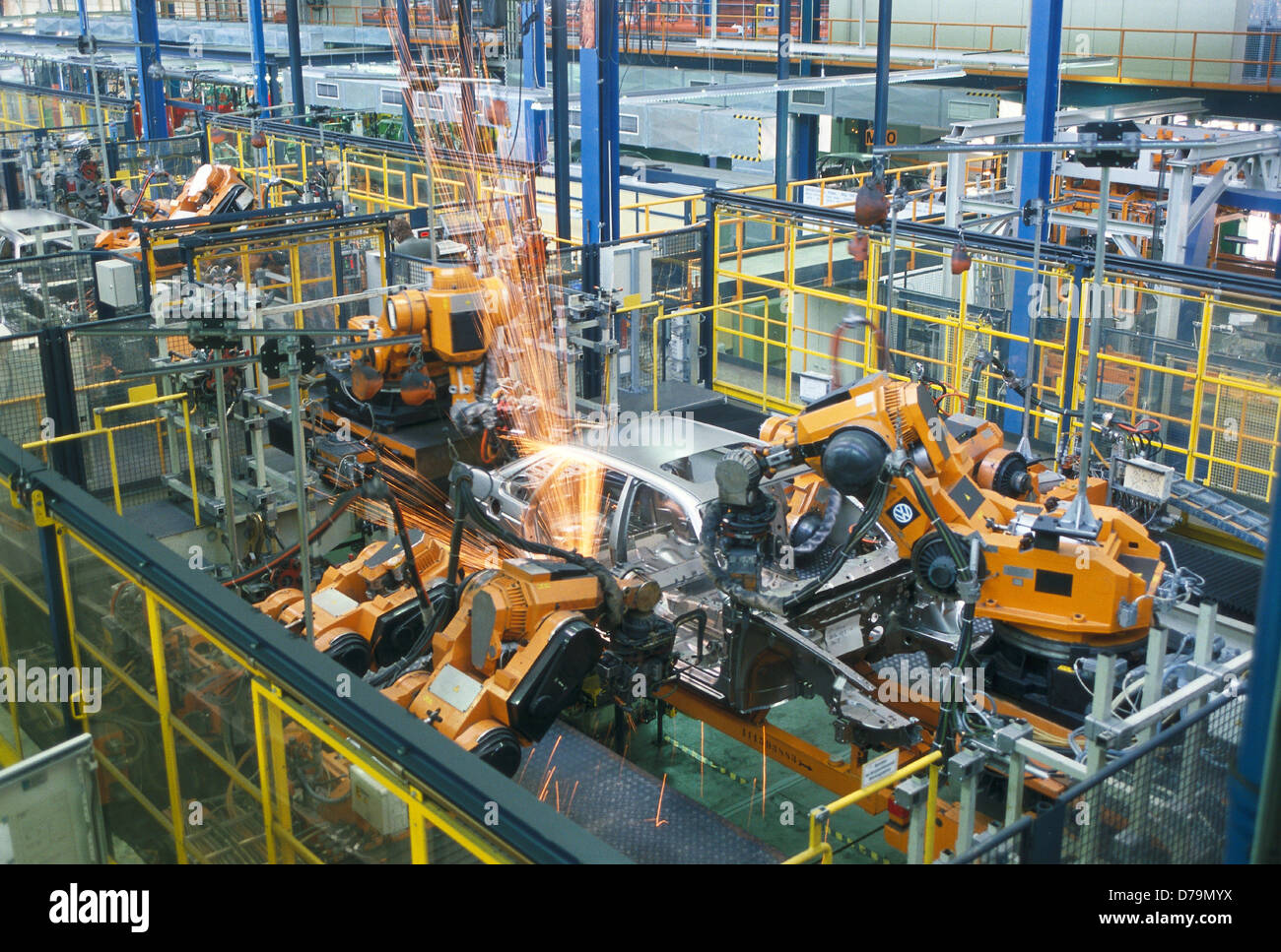 Production line robots welding car body Stock Photo - Alamy