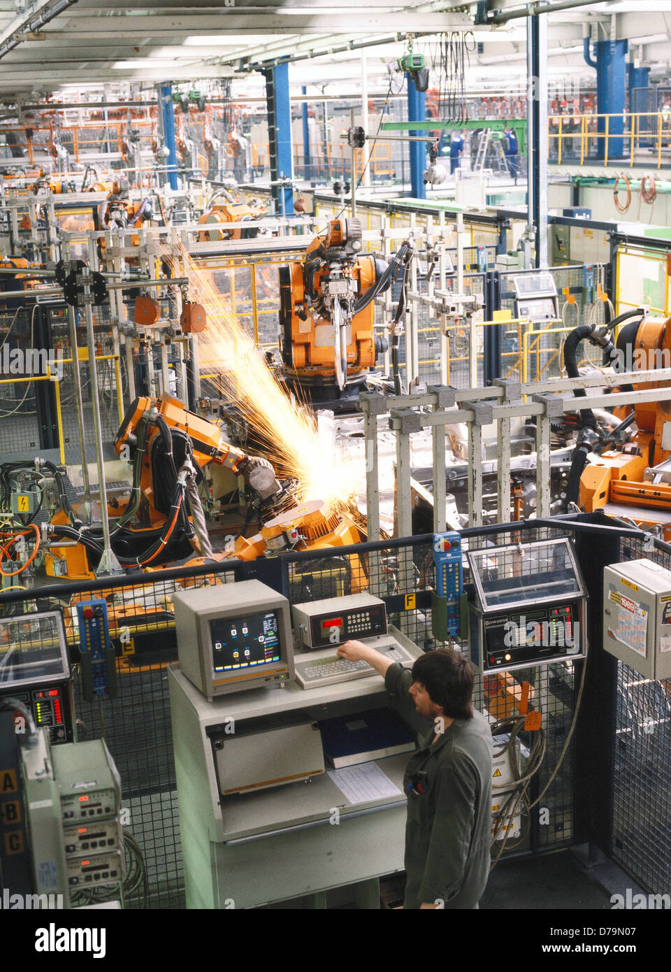 Production line robots welding car body Stock Photo - Alamy