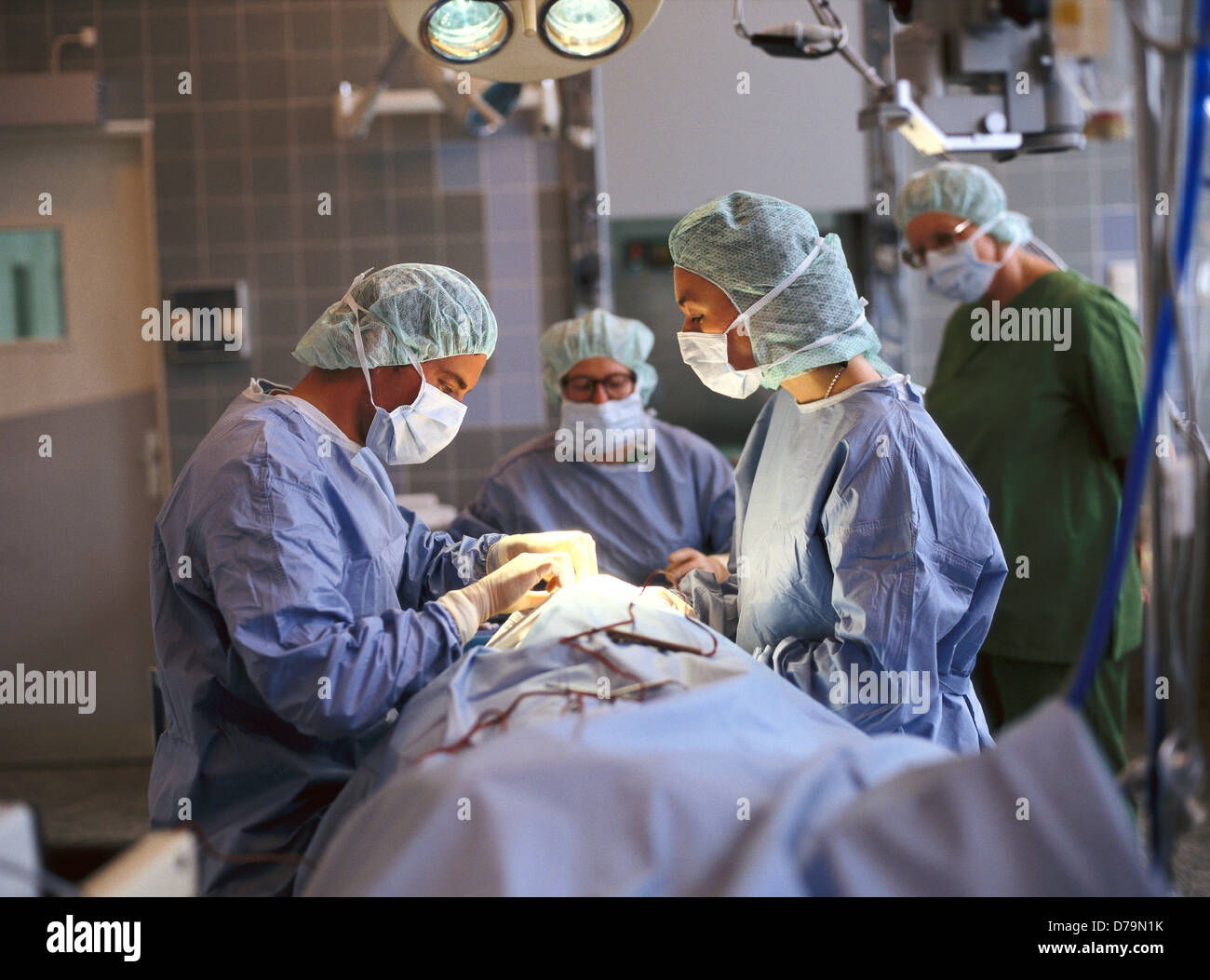 Surgery doctor performing operation Stock Photo - Alamy