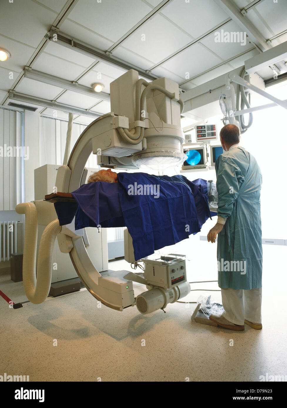 Patient undergoing angiography examination Stock Photo - Alamy