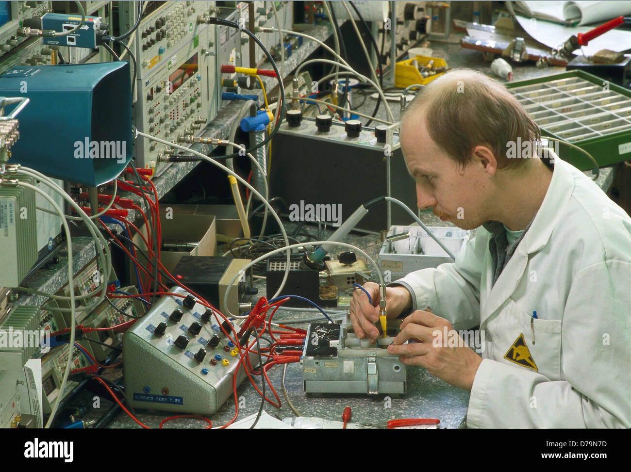 Engineer working on system test benches fiber optic cables Stock Photo ...