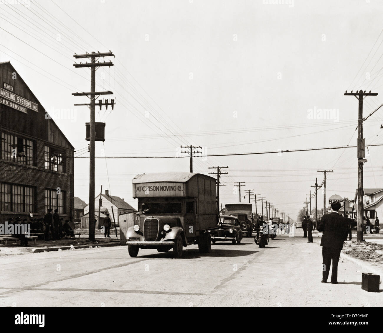 Moving Vans Escorted by Police Stock Photo - Alamy