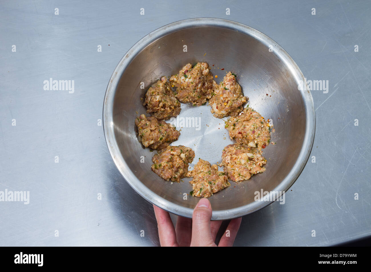 How to make spicy pork cubes Stock Photo - Alamy