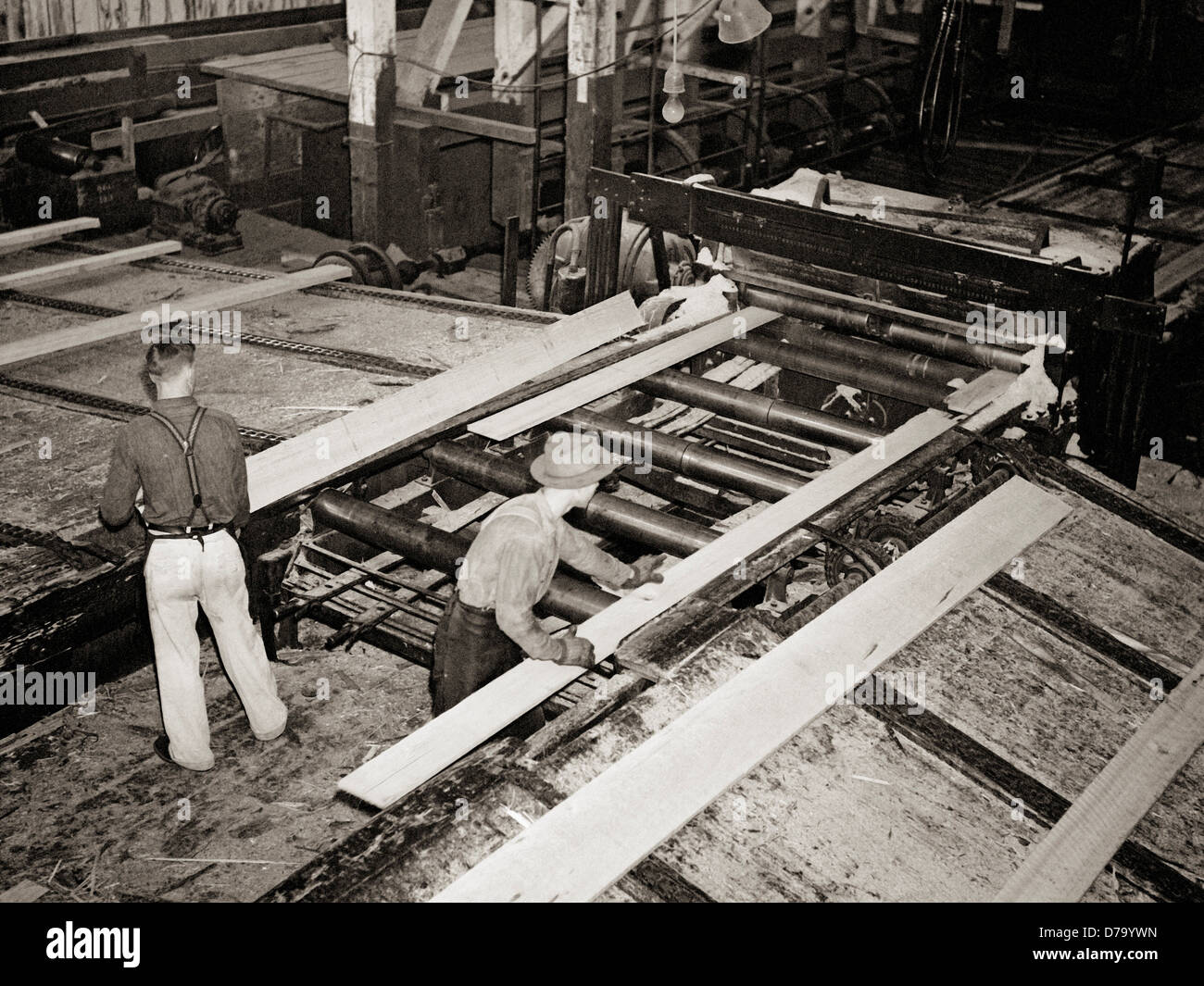 Sawmill workers hi-res stock photography and images - Alamy