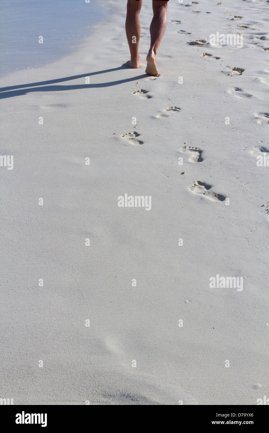 Fresh footprints on the beach Stock Photo - Alamy