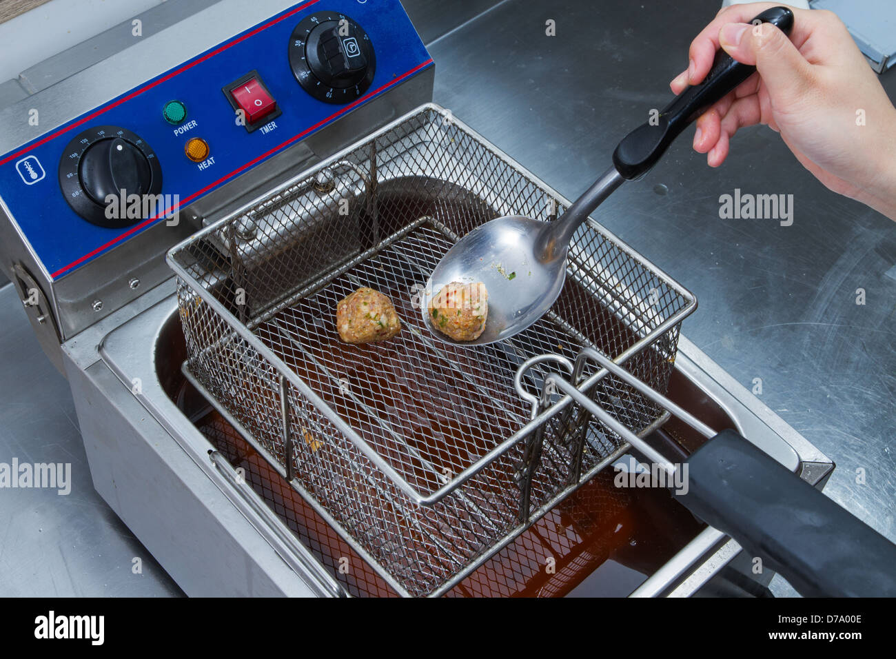 How to make spicy pork cubes Stock Photo - Alamy