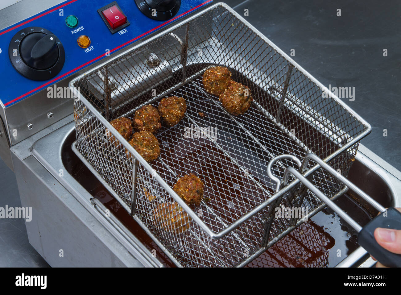 How to make spicy pork cubes Stock Photo - Alamy
