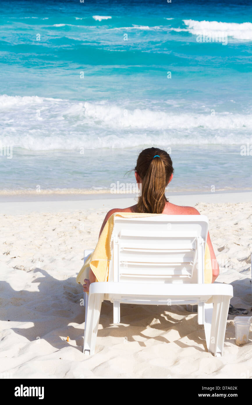 Tanning on the beach of Mexico Stock Photo - Alamy