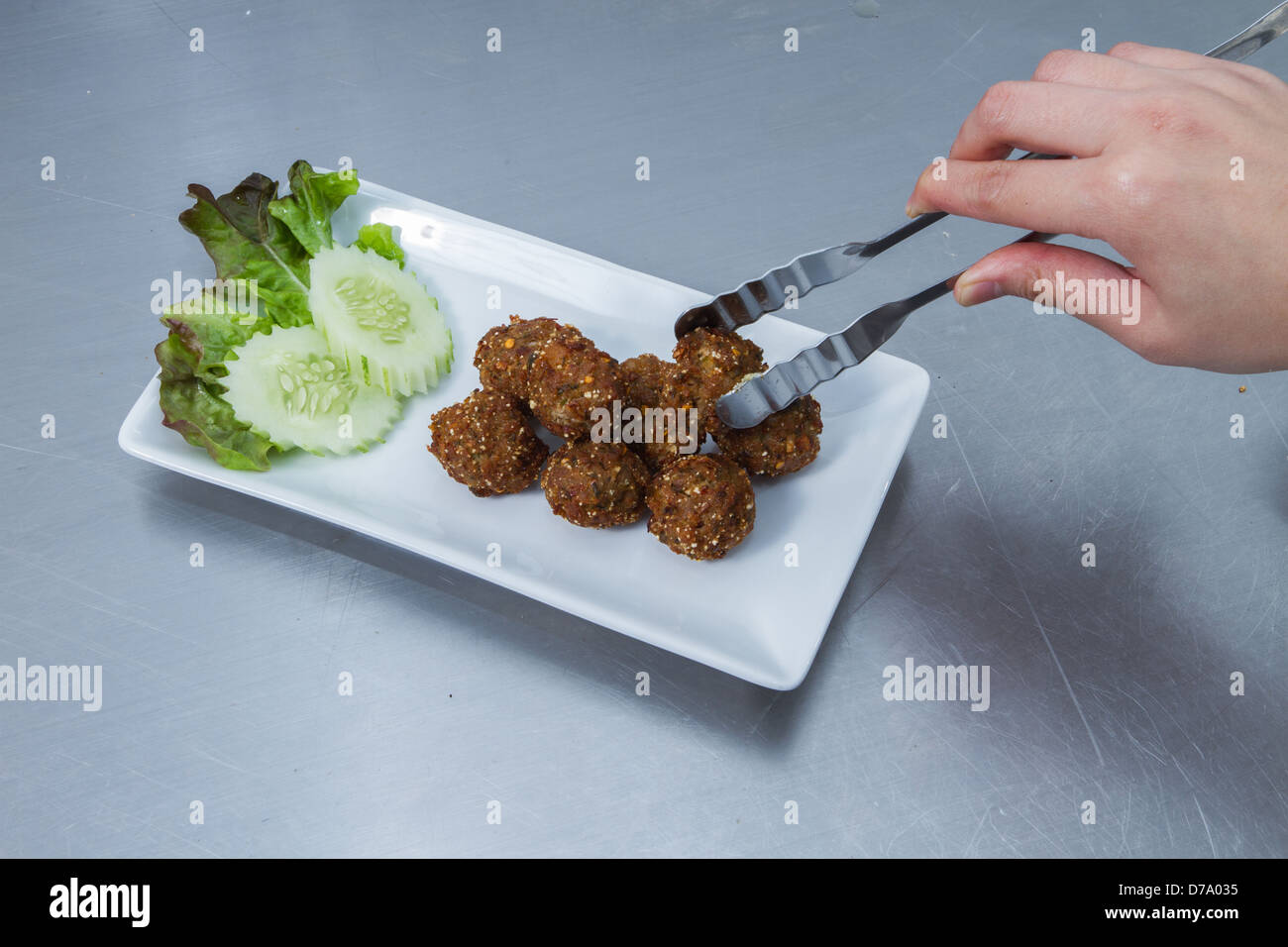 How to make spicy pork cubes Stock Photo - Alamy
