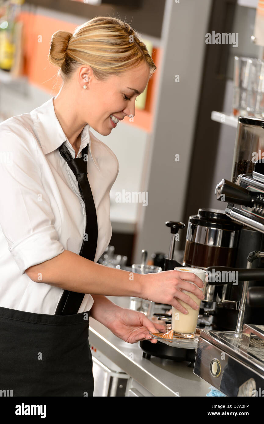 Attractive waitress making coffee with machine in bar Stock Photo - Alamy