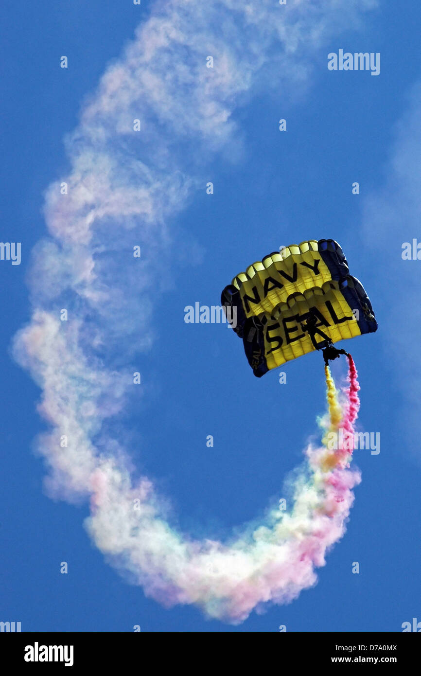 U.S. Navy Parachute Team Leap Frogs Spiral Smoke into Naval Base San ...