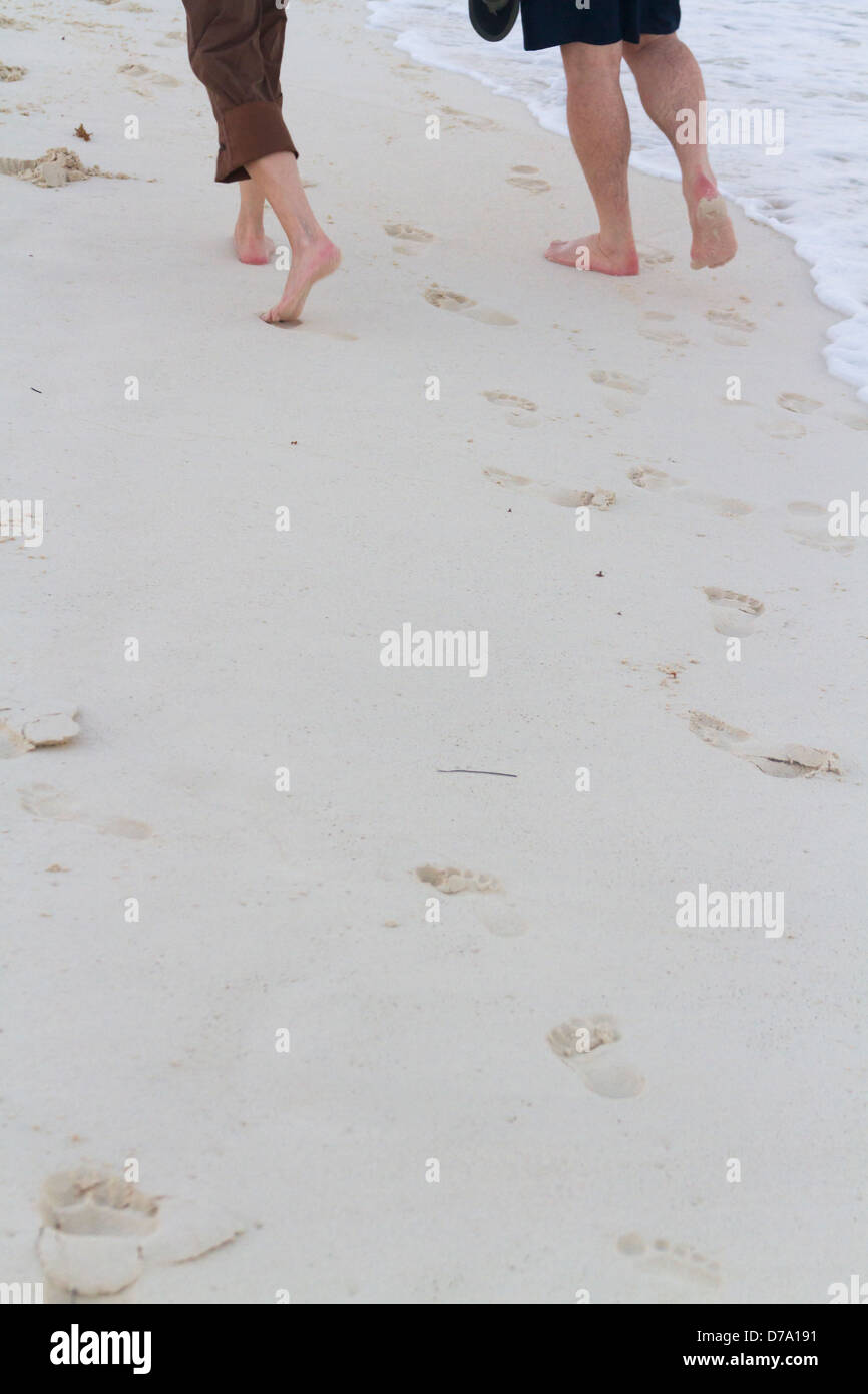 Fresh footprints on the beach Stock Photo - Alamy