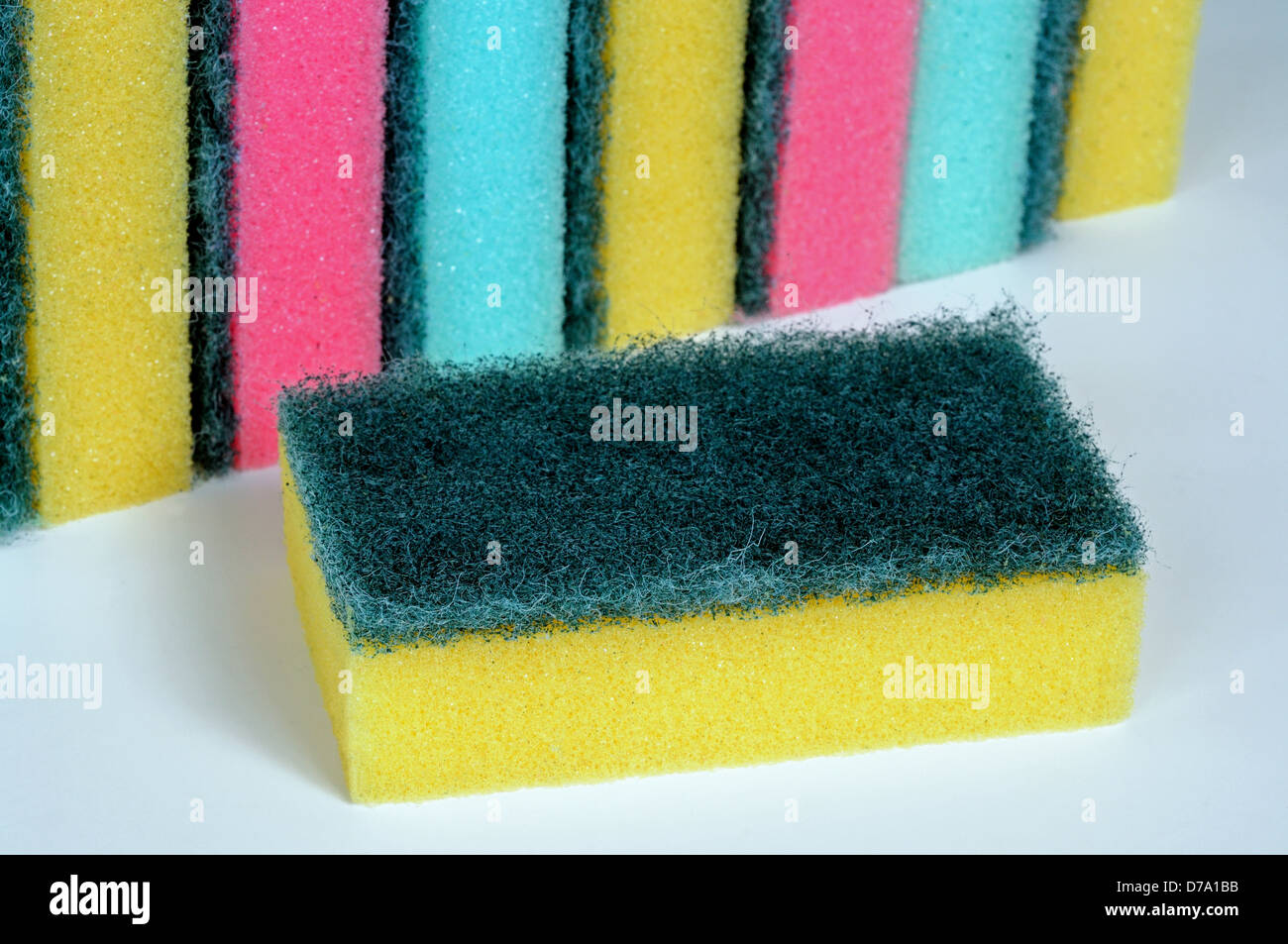Sponge scourers against a plain background Stock Photo - Alamy