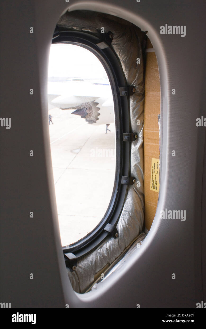Aircraft window showing insulation Stock Photo - Alamy
