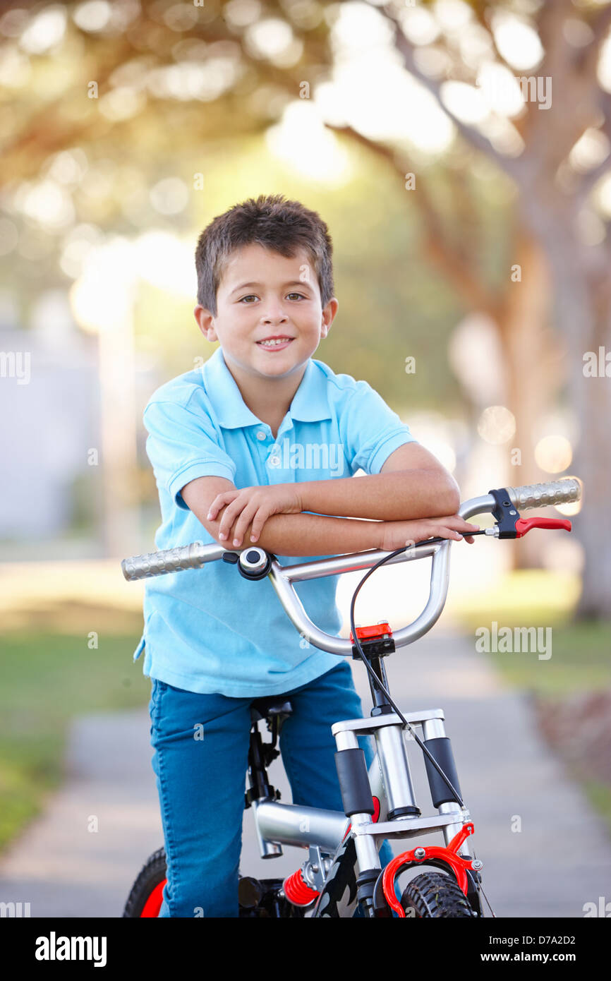 Boy Riding Bike On Path Stock Photo - Alamy