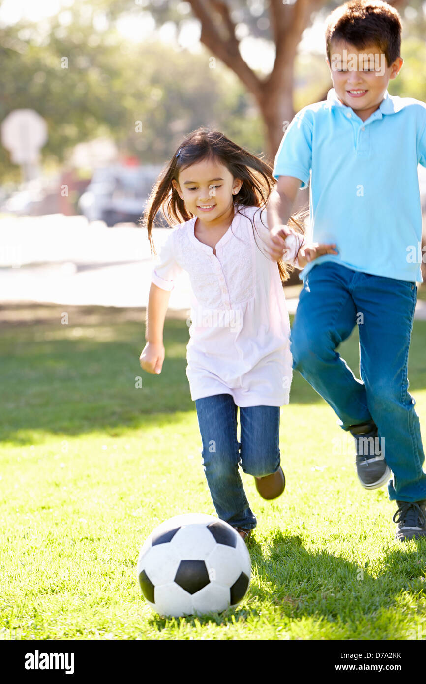 Two Children Playing Soccer Together Stock Photo - Alamy