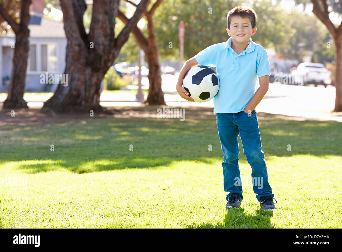 Boy Posing With Soccer ball Stock Photo - Alamy