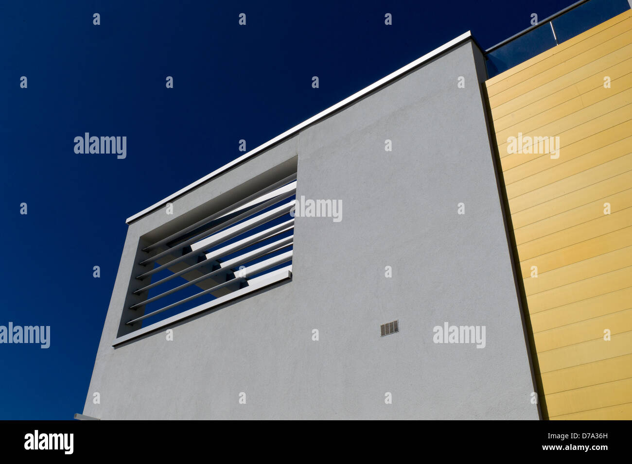 Modern building against blue sky, louvres, cladding Stock Photo - Alamy