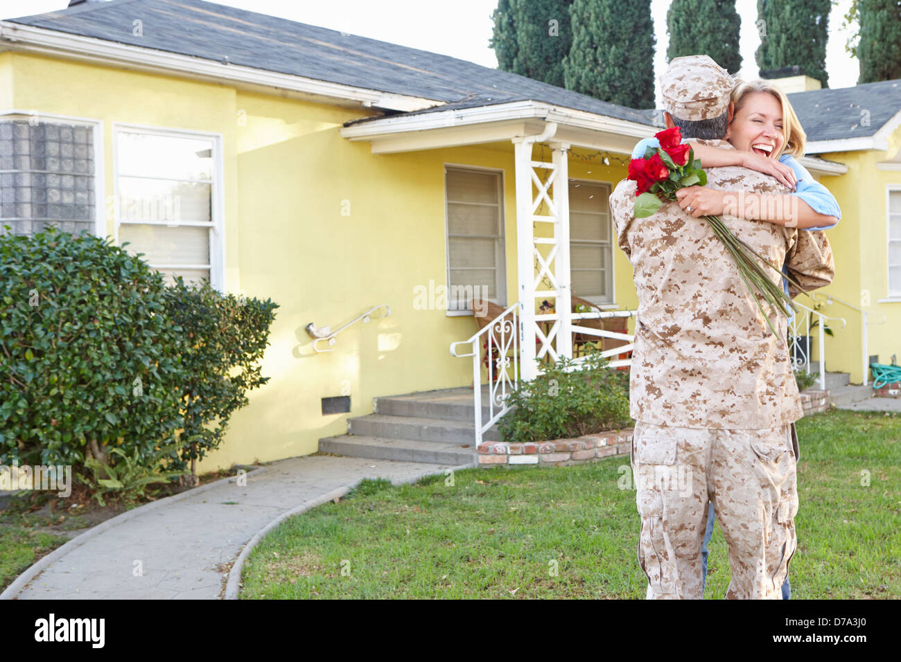 Wife Welcoming Husband Home On Army Leave Stock Photo - Alamy