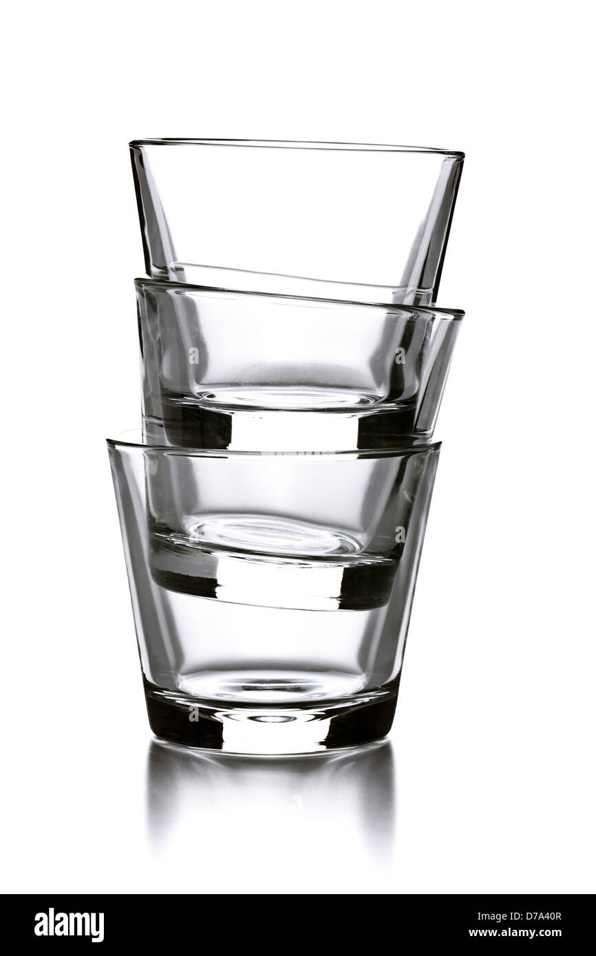 three empty glasses on white background Stock Photo - Alamy