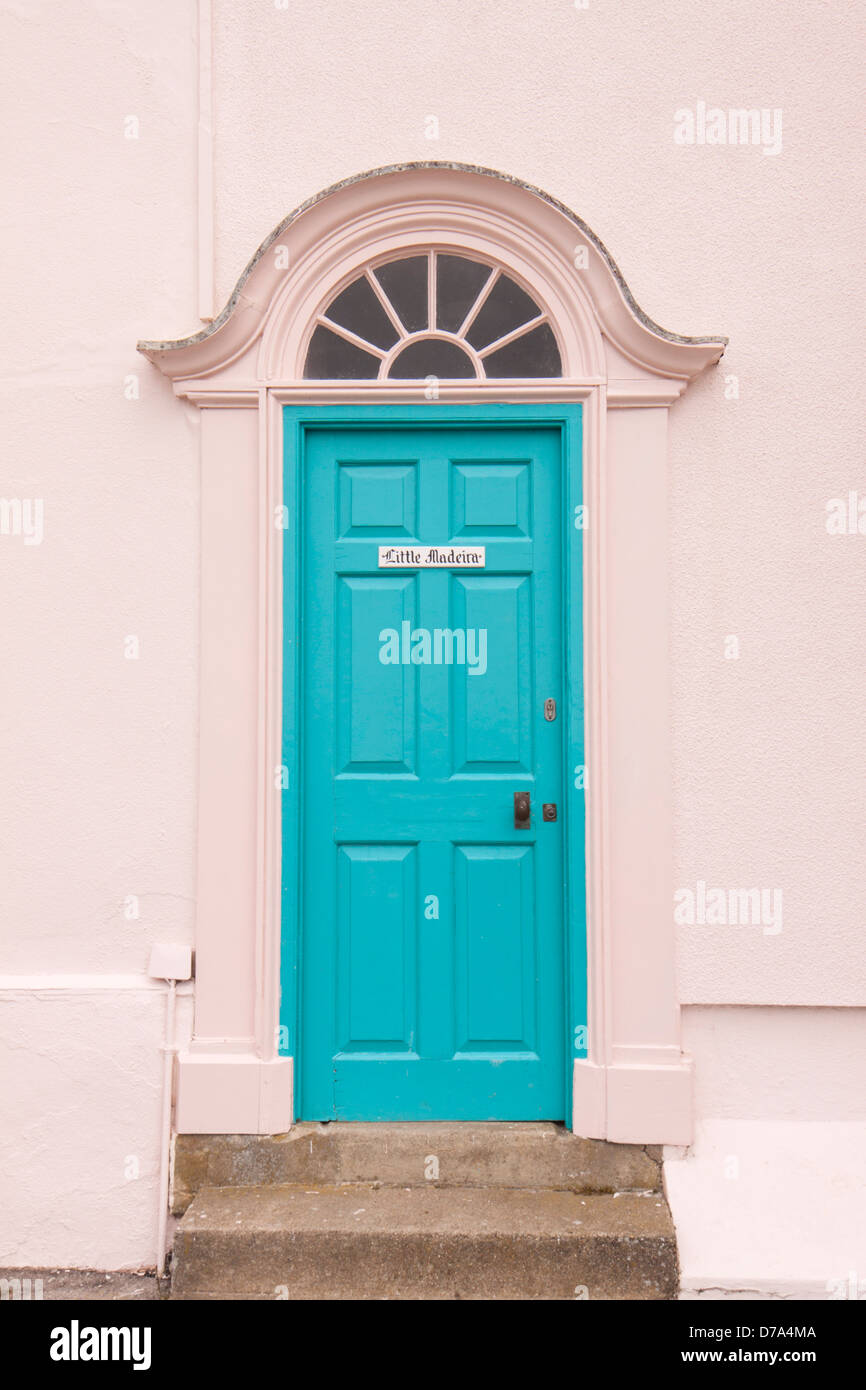Pink cottage with Turquoise Blue door, England, UK Stock Photo - Alamy