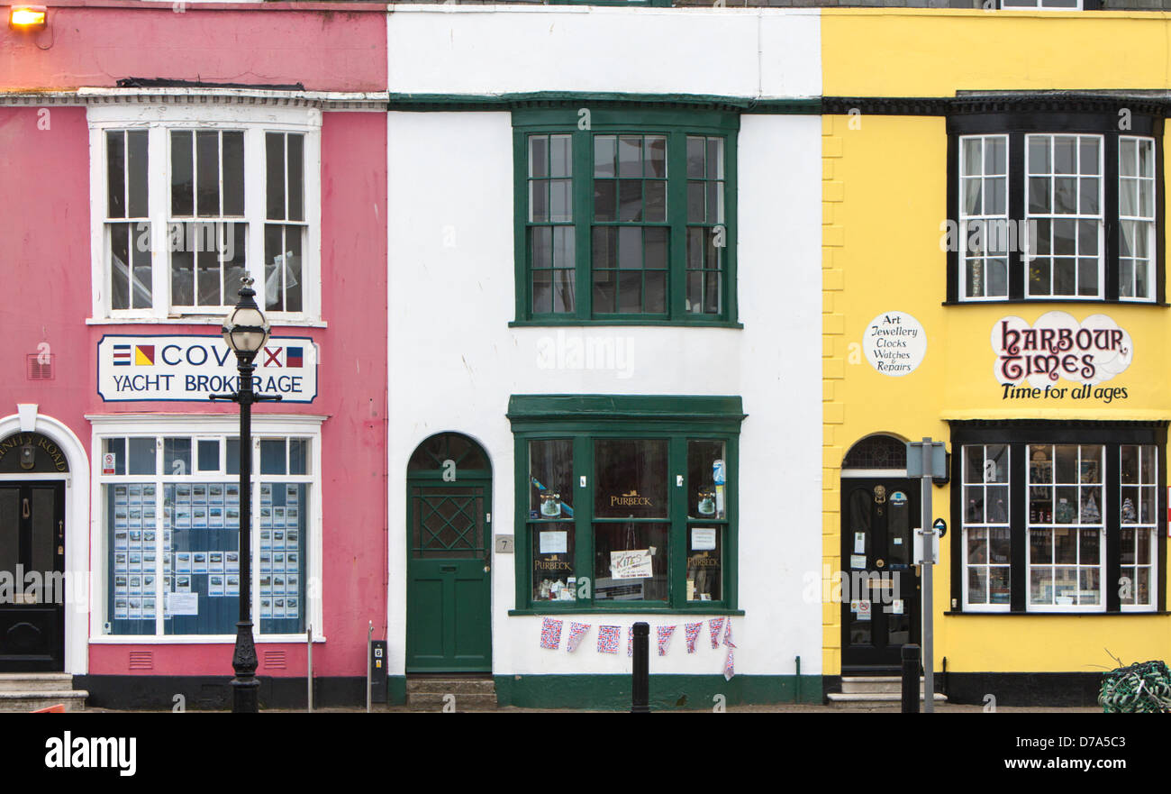 Brightly coloured shops overloking Weymouth Harbour, Dorset, England ...