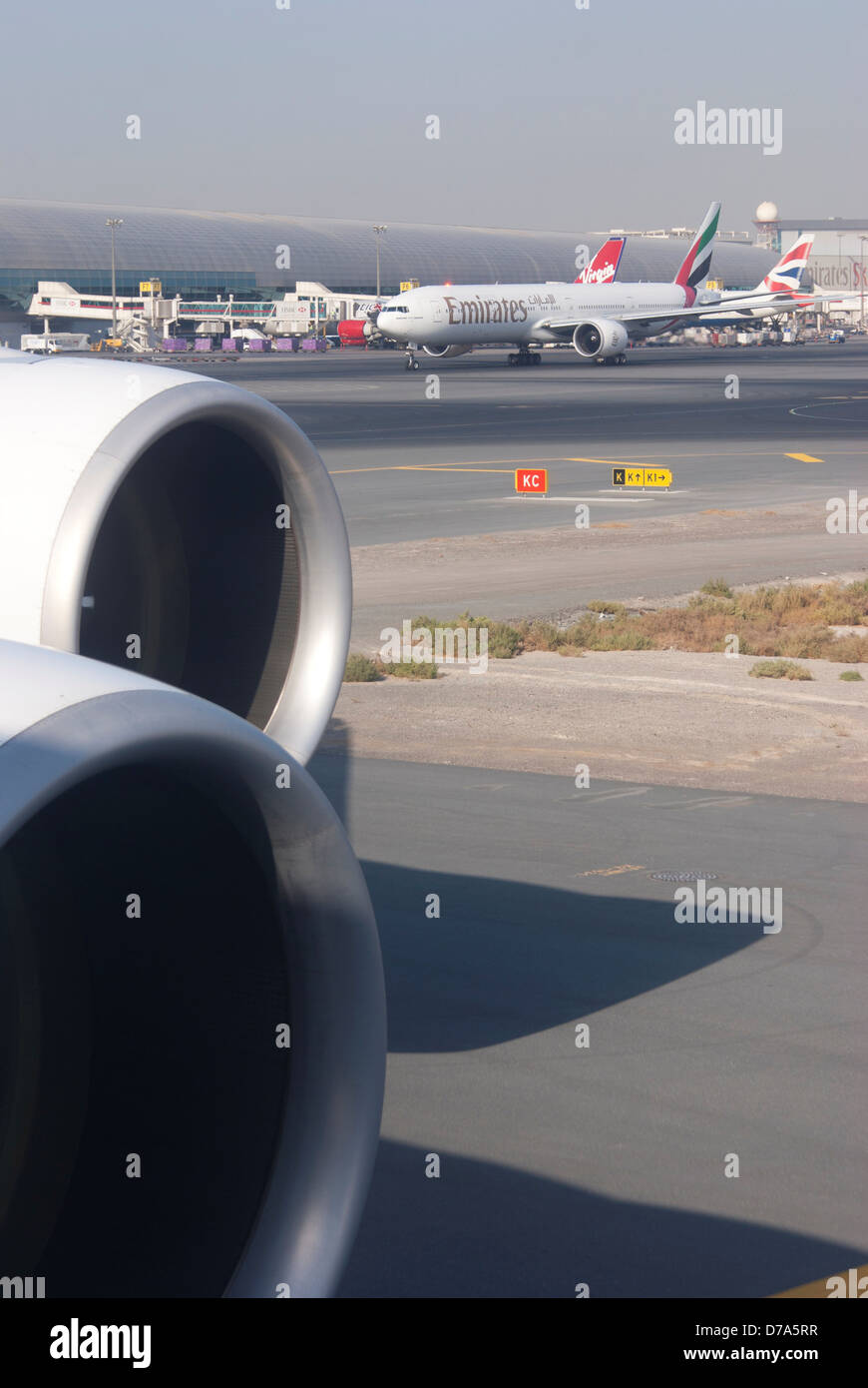 UAE Dubai Aircraft taxiing at airport Stock Photo - Alamy