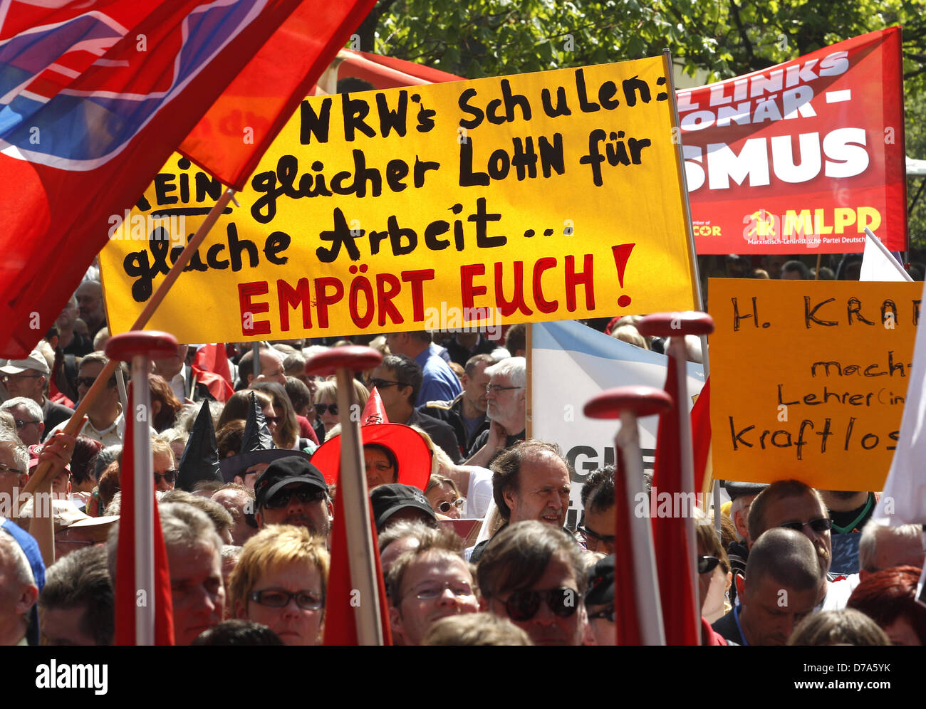 People demonstrate at a May Day rally by the Confederation of German ...