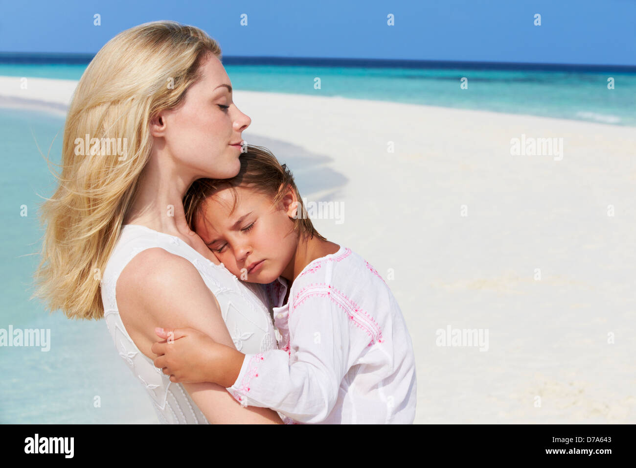 Cuddling on beach hi-res stock photography and images - Alamy