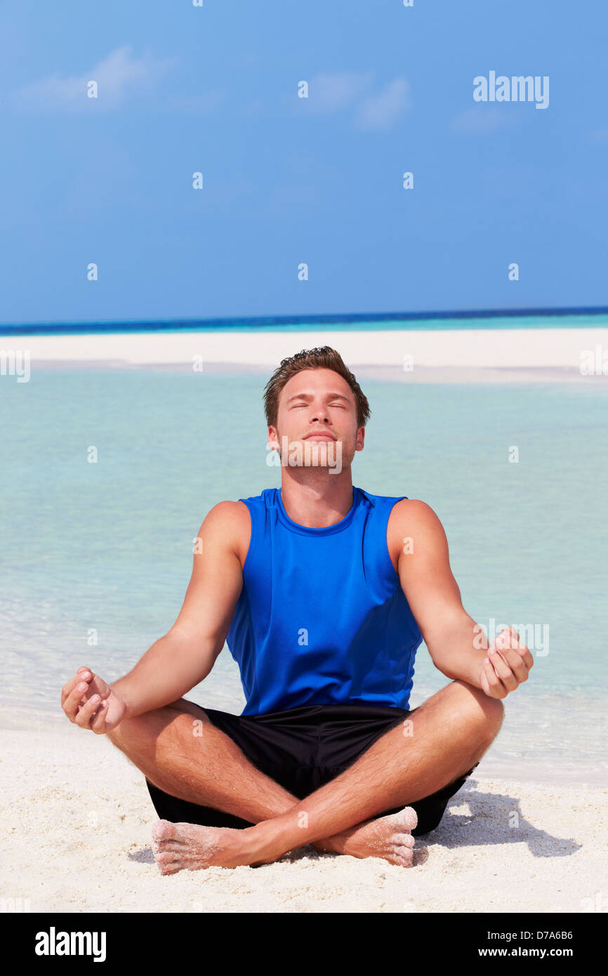 Peaceful man meditating on yoga hi-res stock photography and images - Alamy